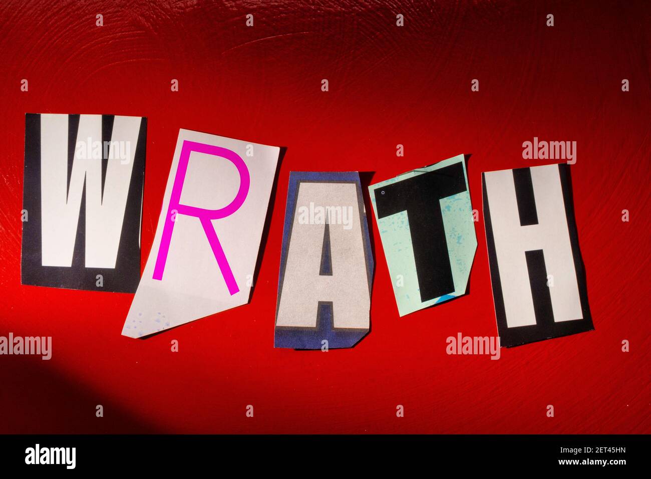 The word "Wrath" using cut-out paper letters in the ransom note effect ...