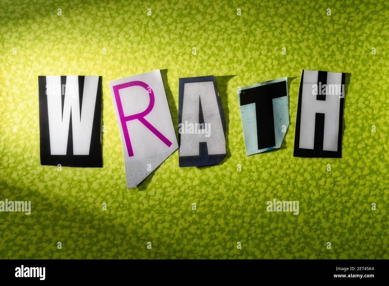 The word "Wrath" using cut-out paper letters in the ransom note effect ...