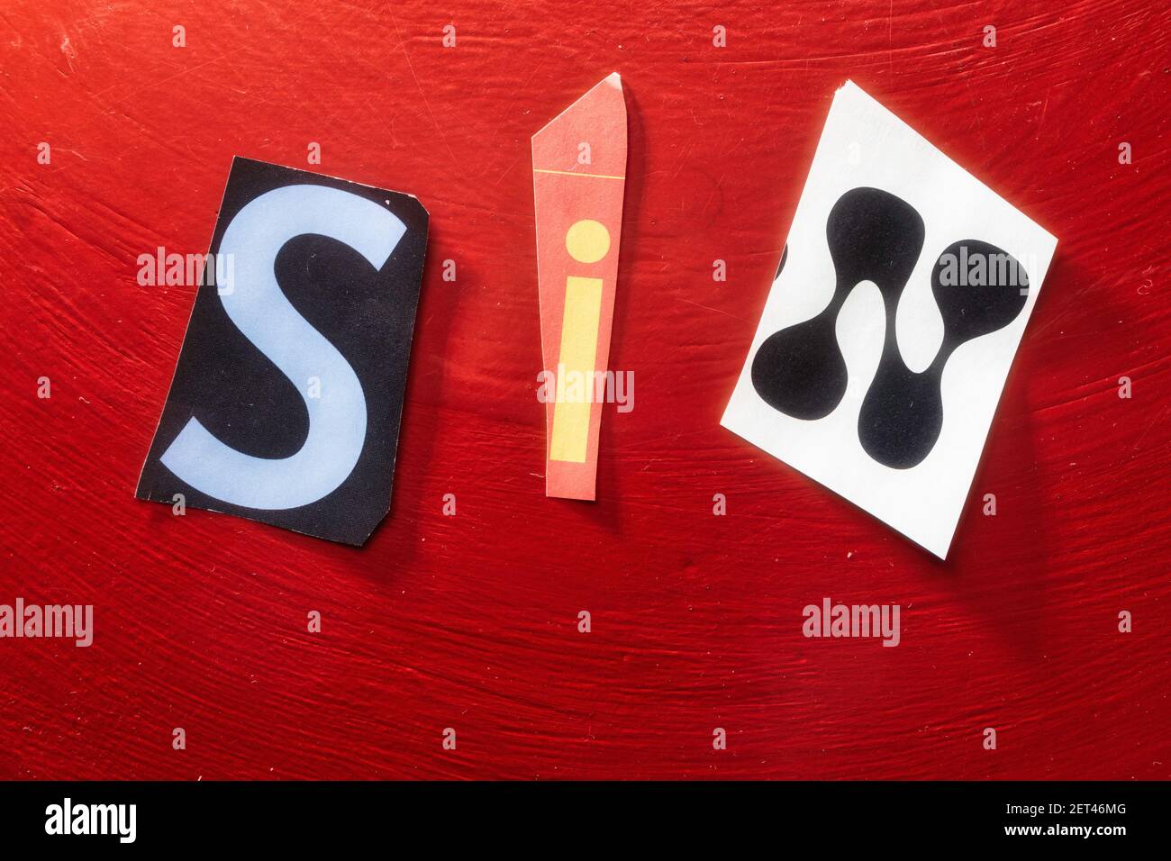 The word "SIN" using cut-out paper letters in the ransom note effect ...