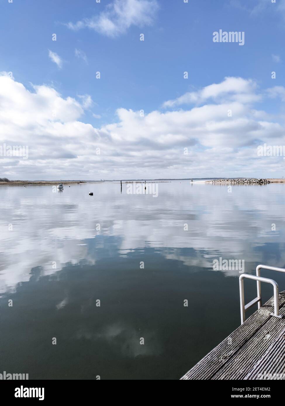 Photo of touristic wooden pier with observation deck entering the sea ...