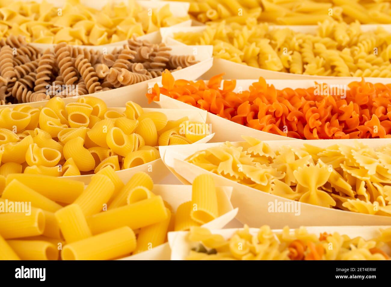 Various kind of Italian pasta in the bamboo bowls Stock Photo - Alamy