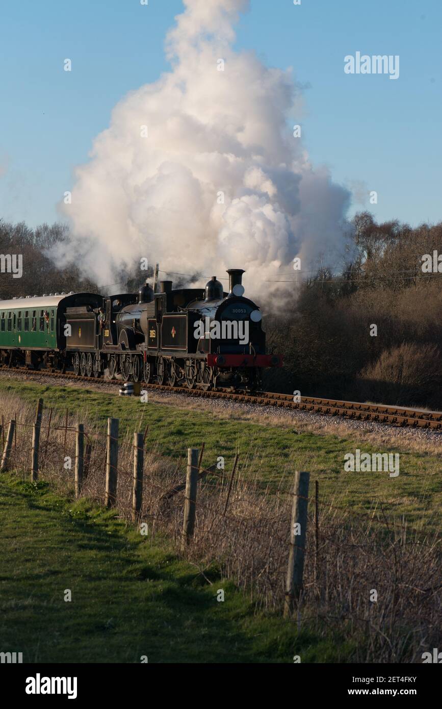 a double headed steam train leaves Norden on the Swanage Heritage ...
