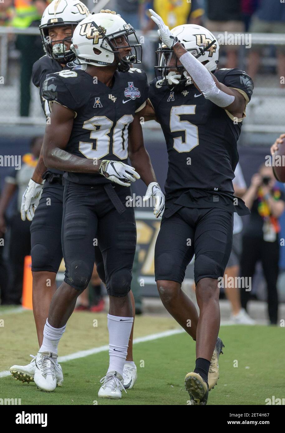 December 1, 2018: UCF's Dredrick Snelson #5 congratulates Greg McCrae ...