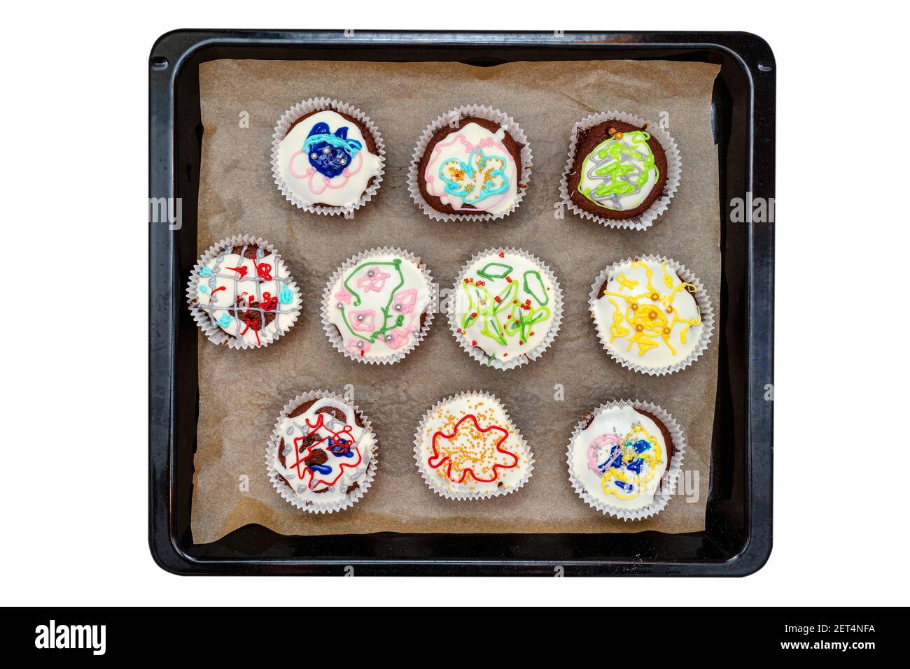 Chocolate brown muffins wrapped in white paper and covered with white ...