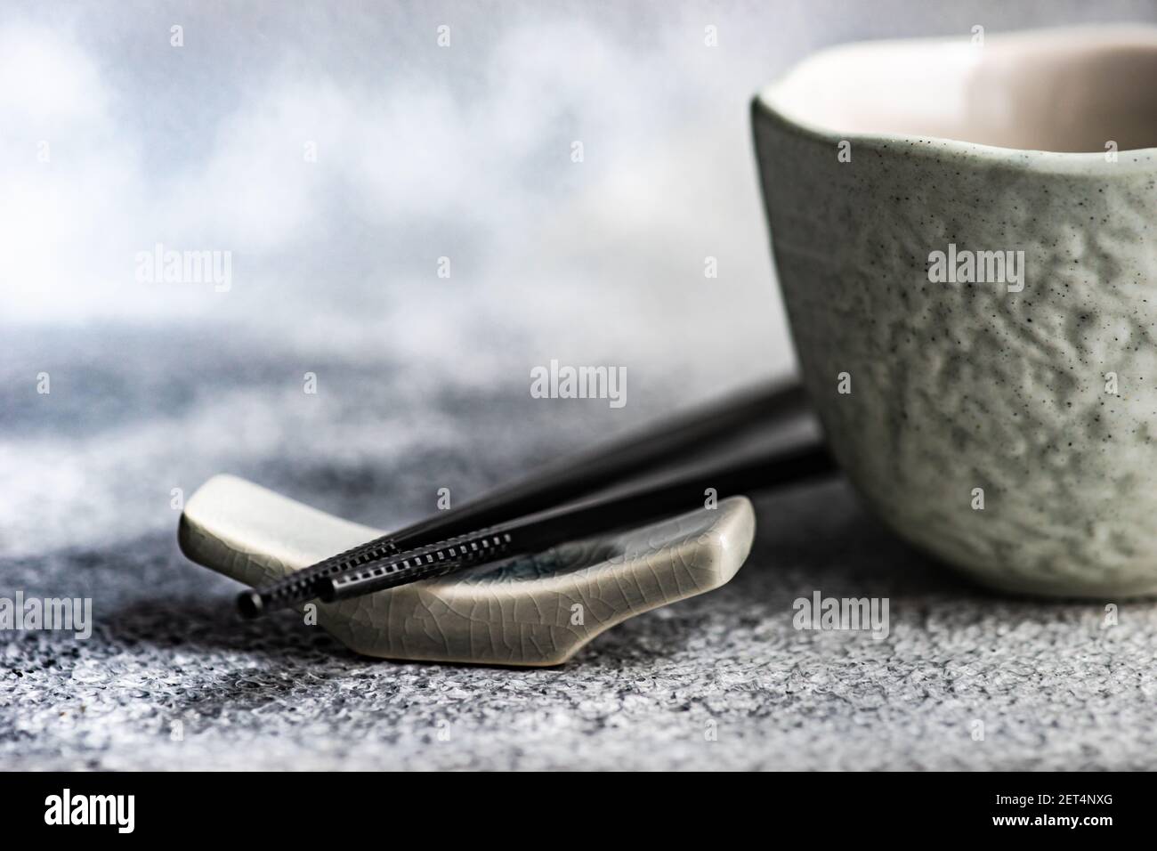 Asian table setting with chopsticks on a chopsticks rest Stock Photo ...