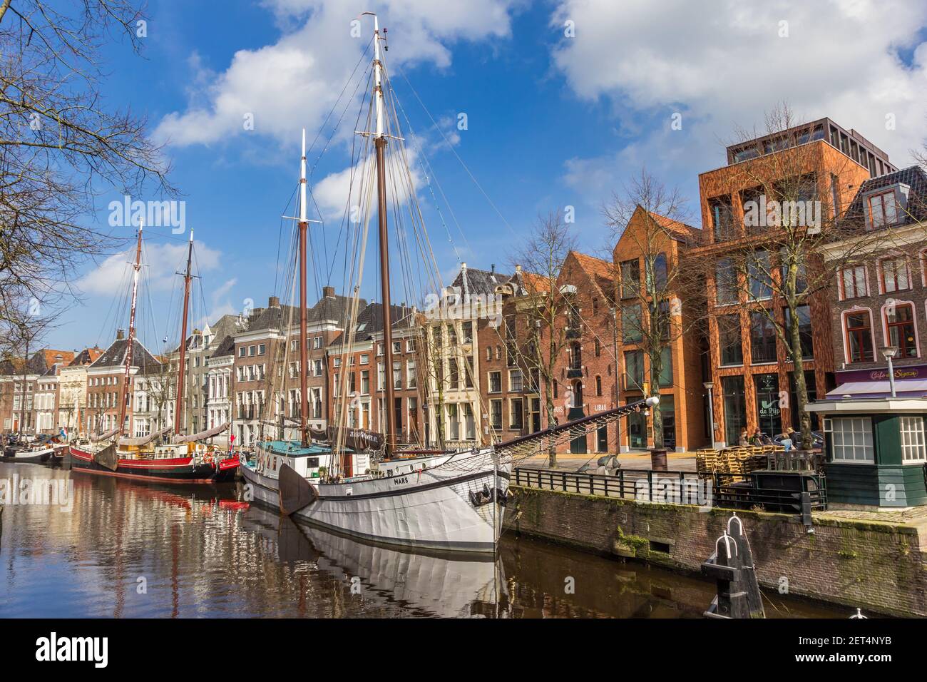 Historic ships and warehouses at the canal in Groningen, Netherlands ...