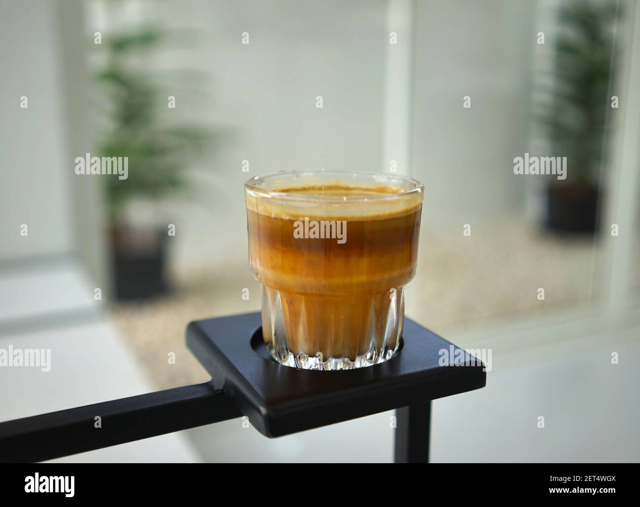Dirty coffee in a coffee shop Stock Photo - Alamy