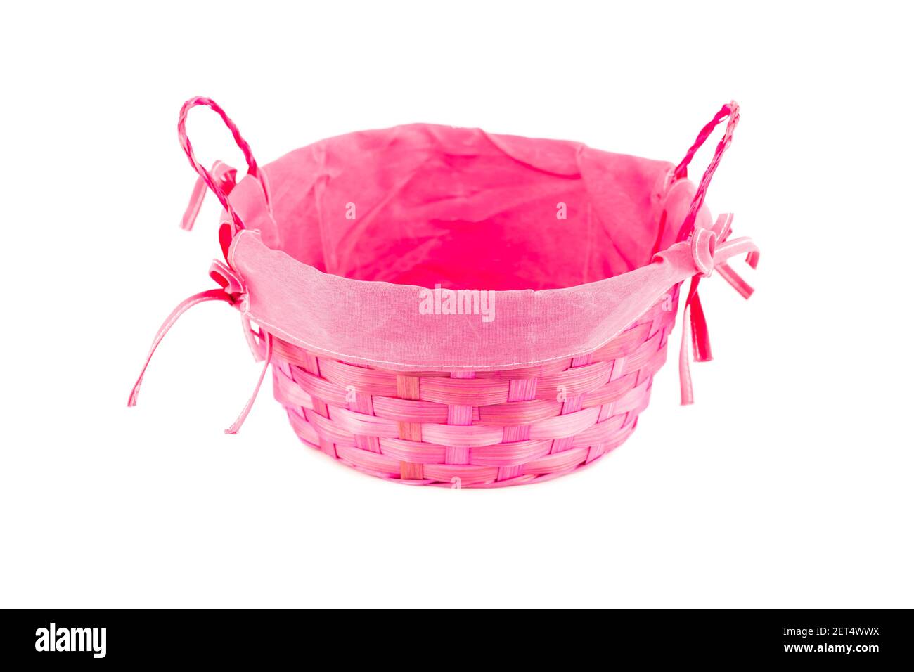 Pink empty wicker baskets isolated on white background Stock Photo - Alamy