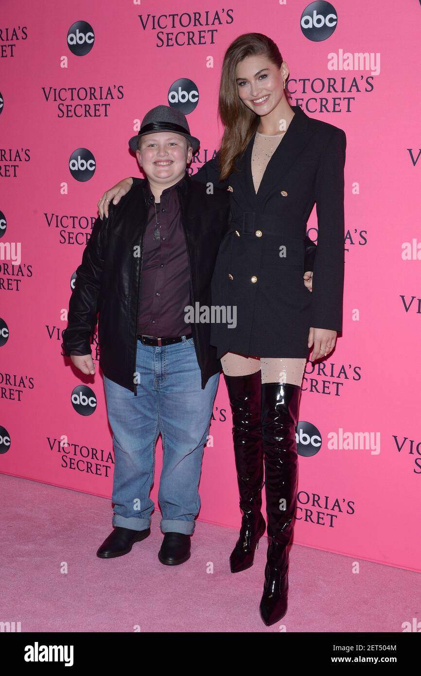 Model Grace Elizabeth (r) poses with her brother Luke as they attend ...