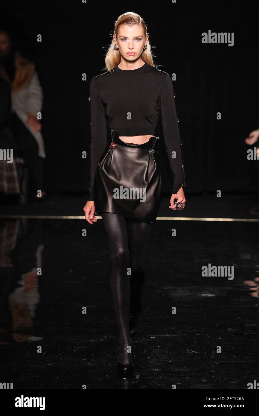 Model Stella Maxwell walks on the runway during the Versace Pre-Fall ...