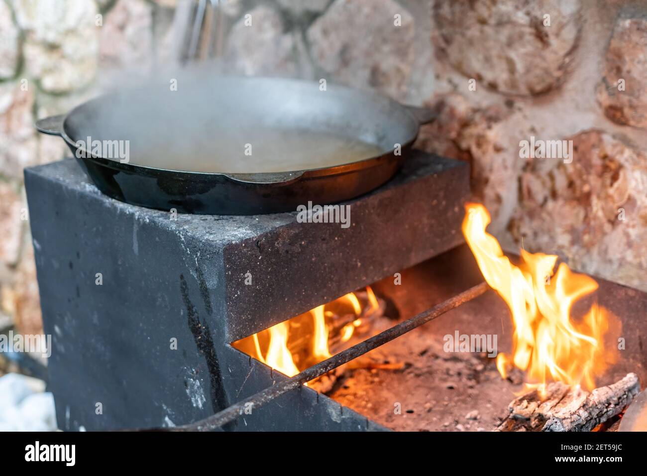 Large cauldron with freshly cooked rice. A series of the process of ...