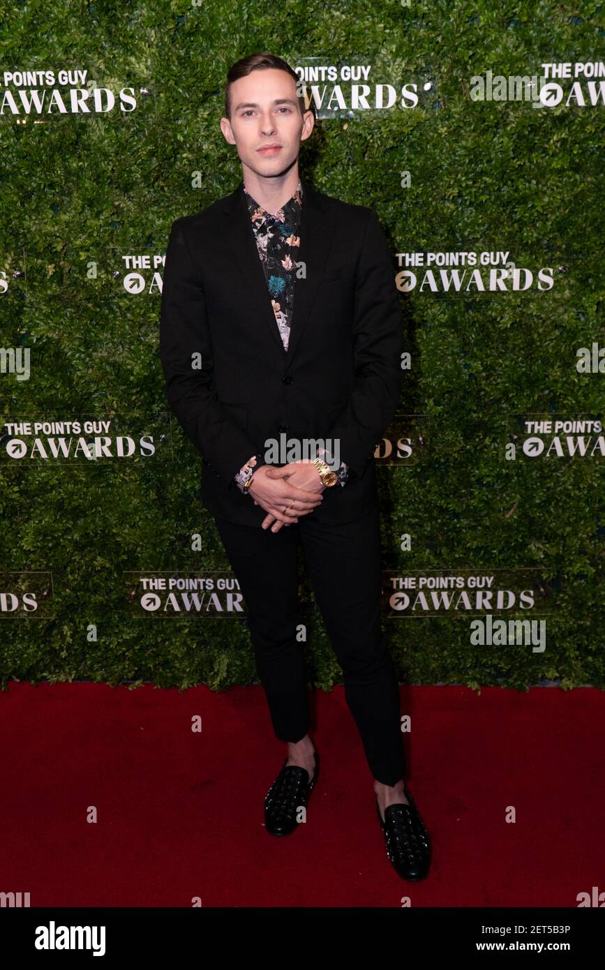 Adam Rippon attends The Points Guy Awards held at the Intrepid Air and ...