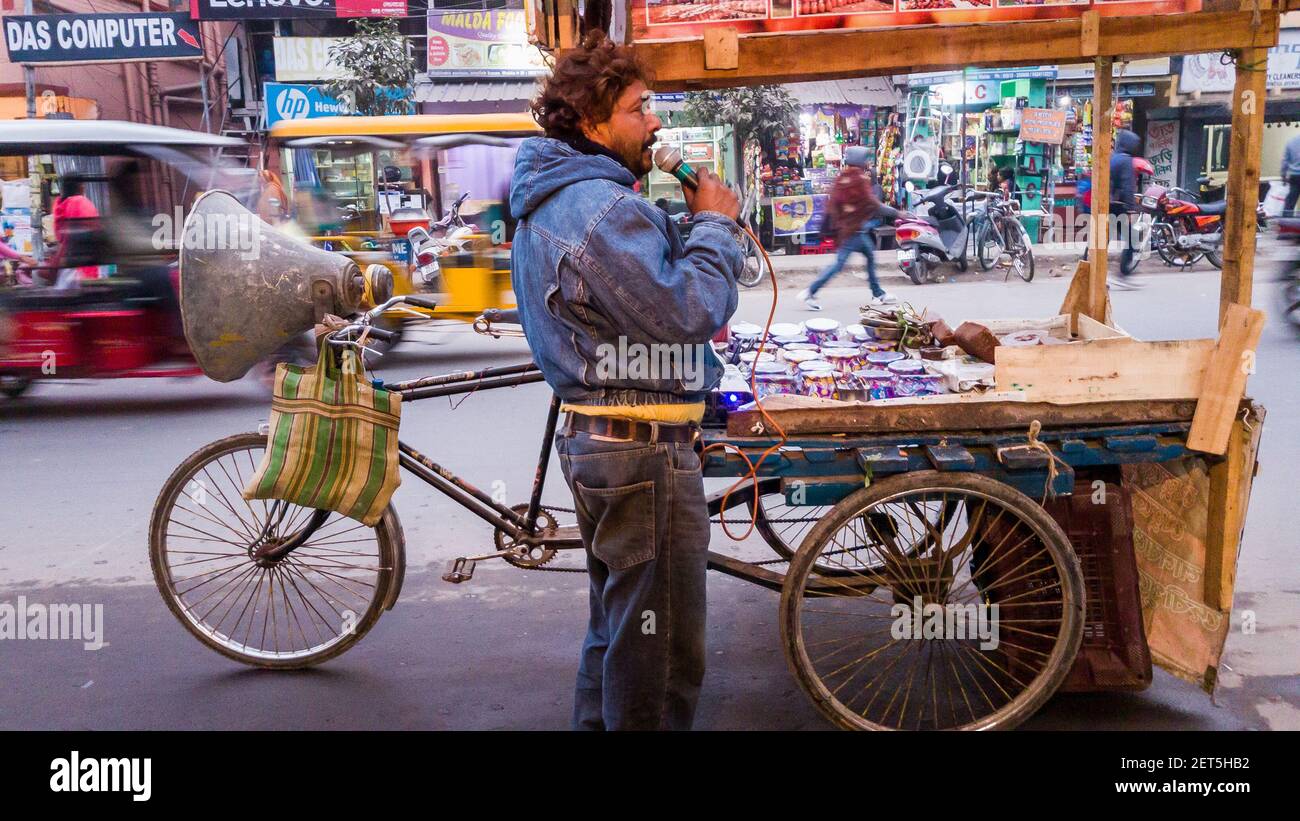 Malda, West Bengal, India - January 2018: An Indian street vendor with ...