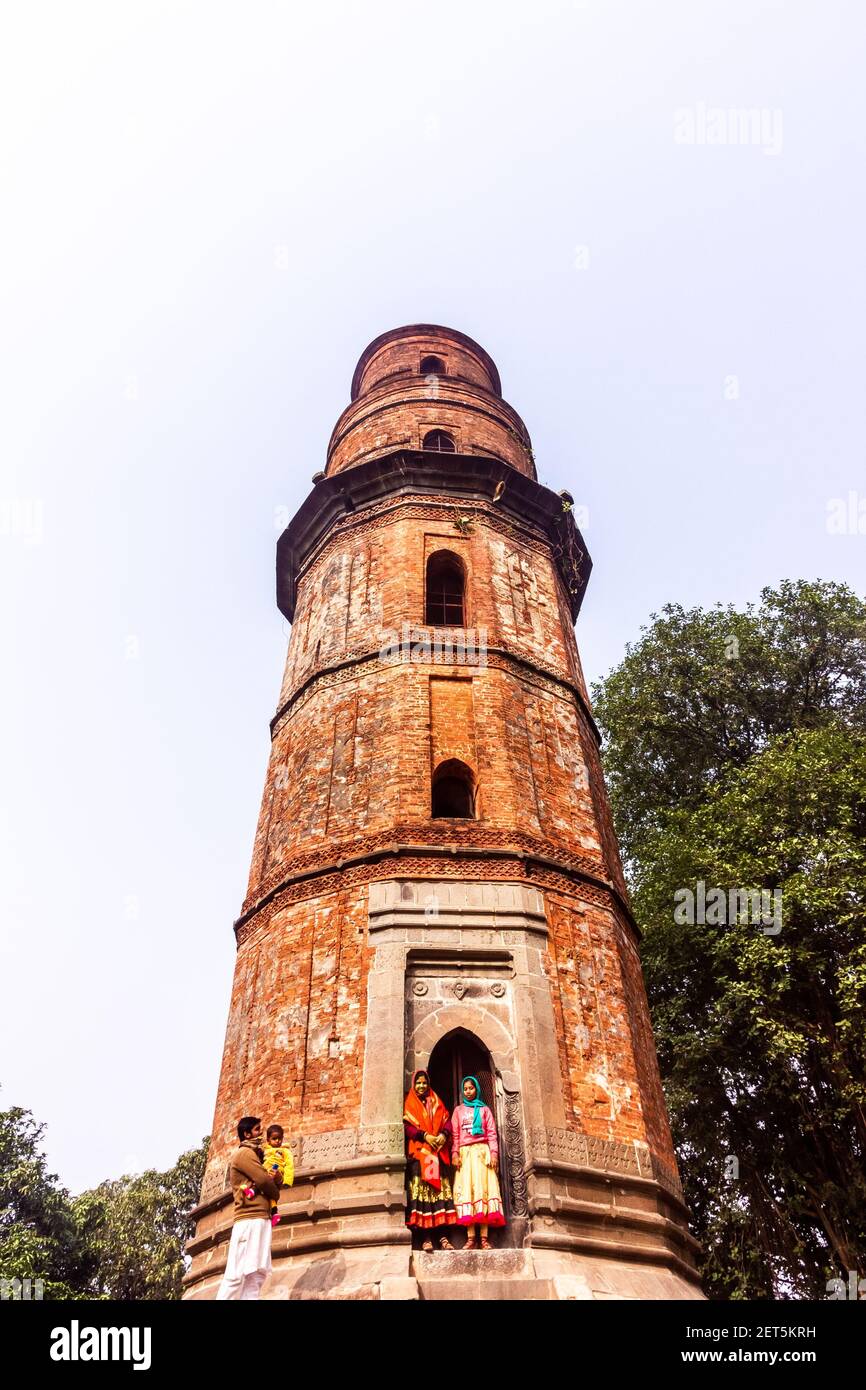 Malda, West Bengal, India - January 2018: An ancient tall stone pillar ...