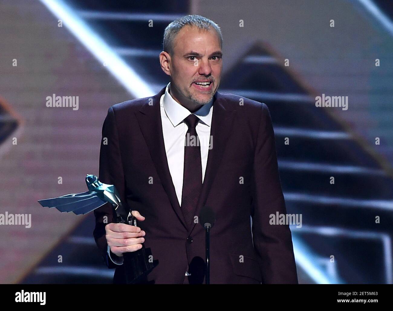 LOS ANGELES - DECEMBER 6: Greg Thomas (C) accepts the Industry Icon ...