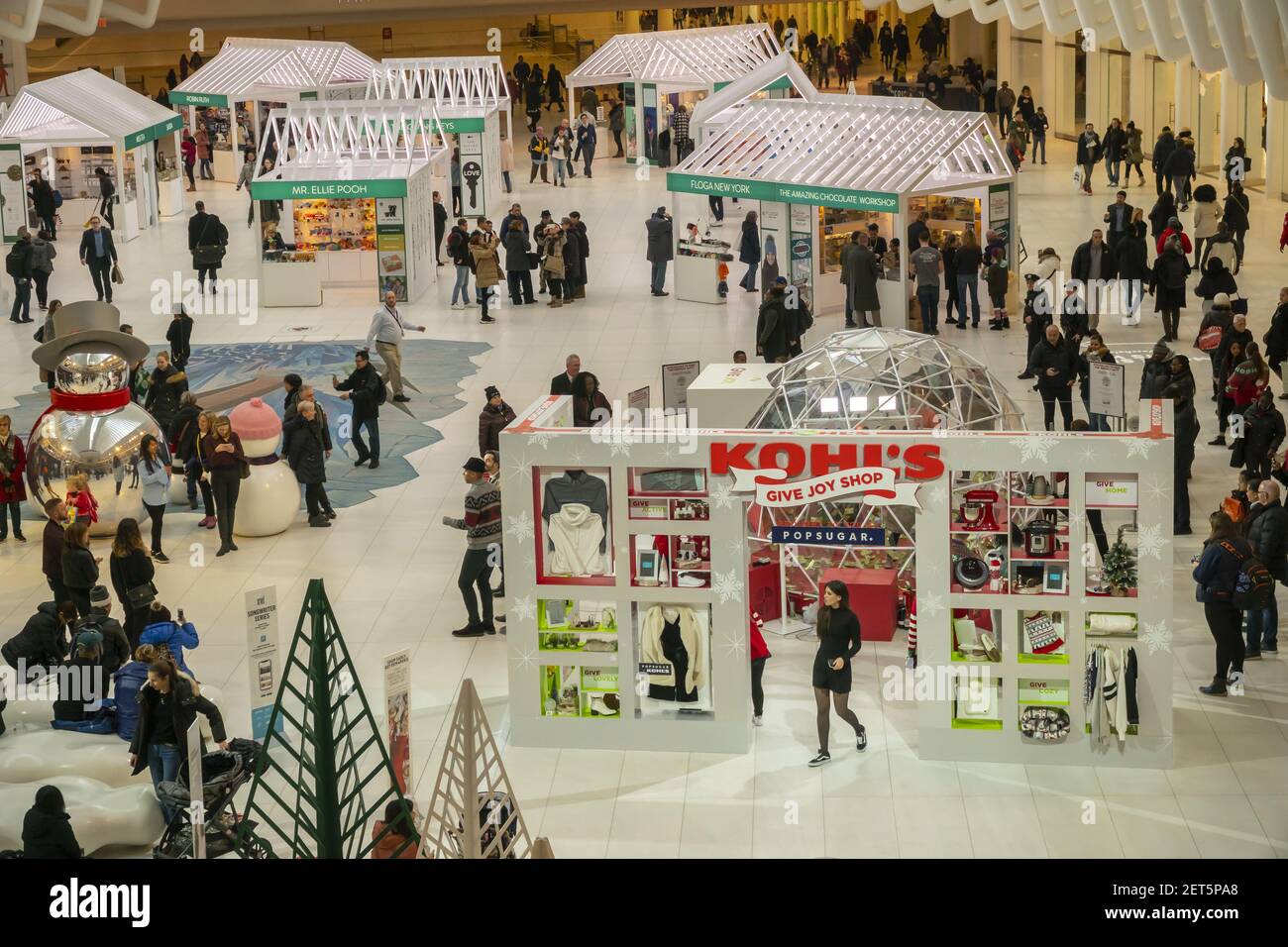 Visitors crowd the Kohl's "Give Joy Shop" pop-up branding event in the ...