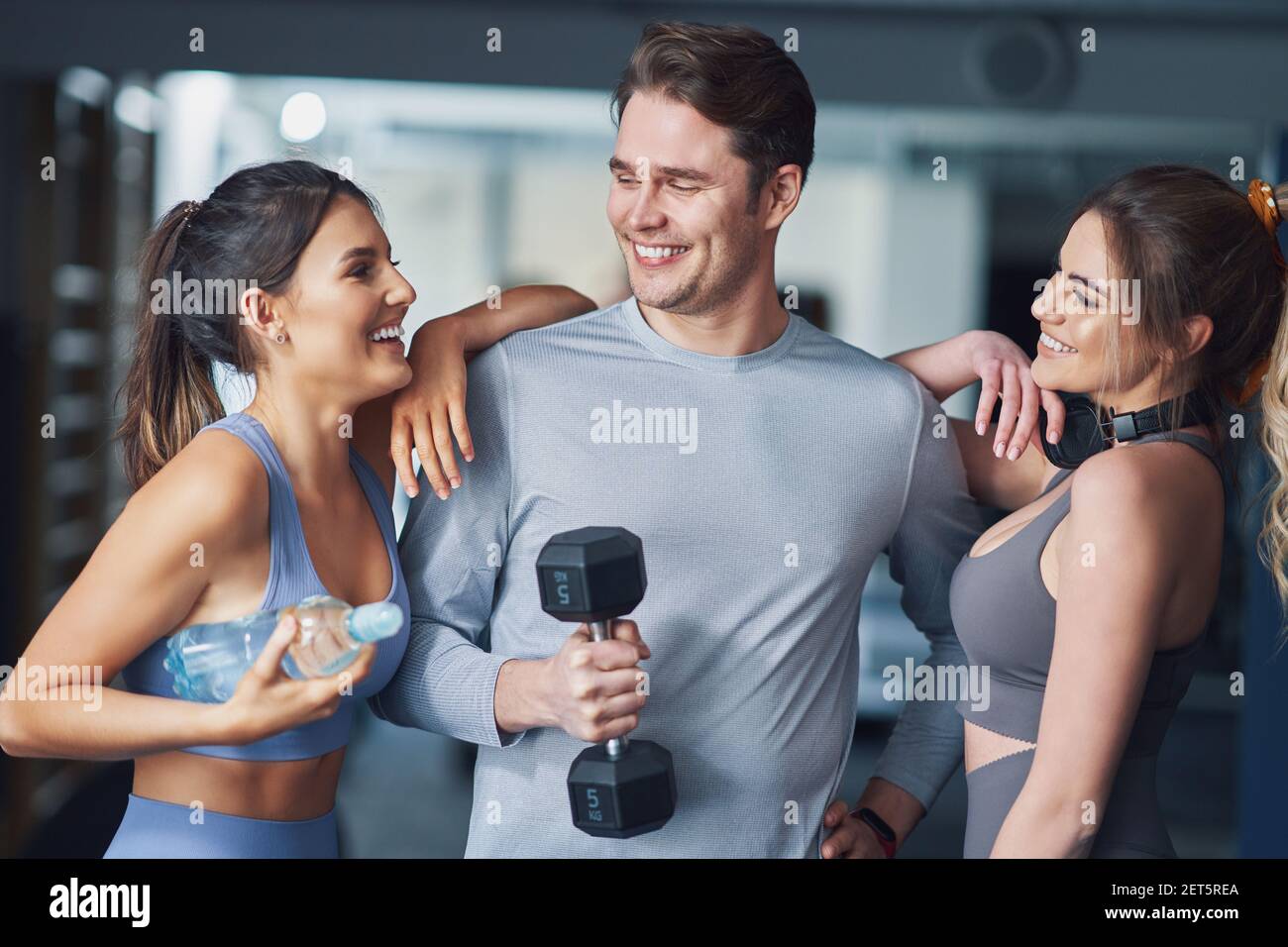 Group of people working out in a gym Stock Photo - Alamy