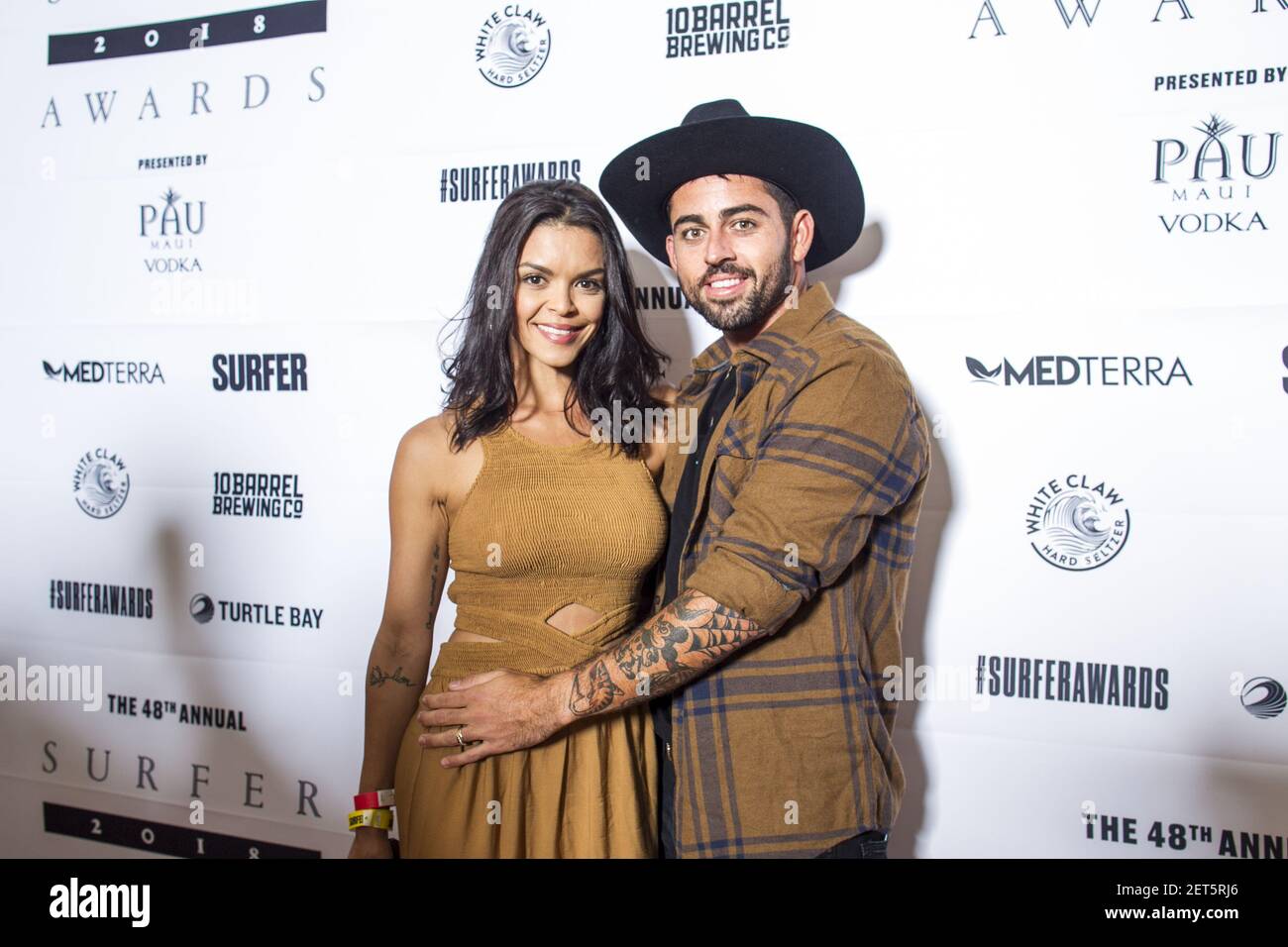 December 6, 2018 - Tahiti Kemper and 2018 Peahi Champion Billy Kemper poses on the red carpet ...