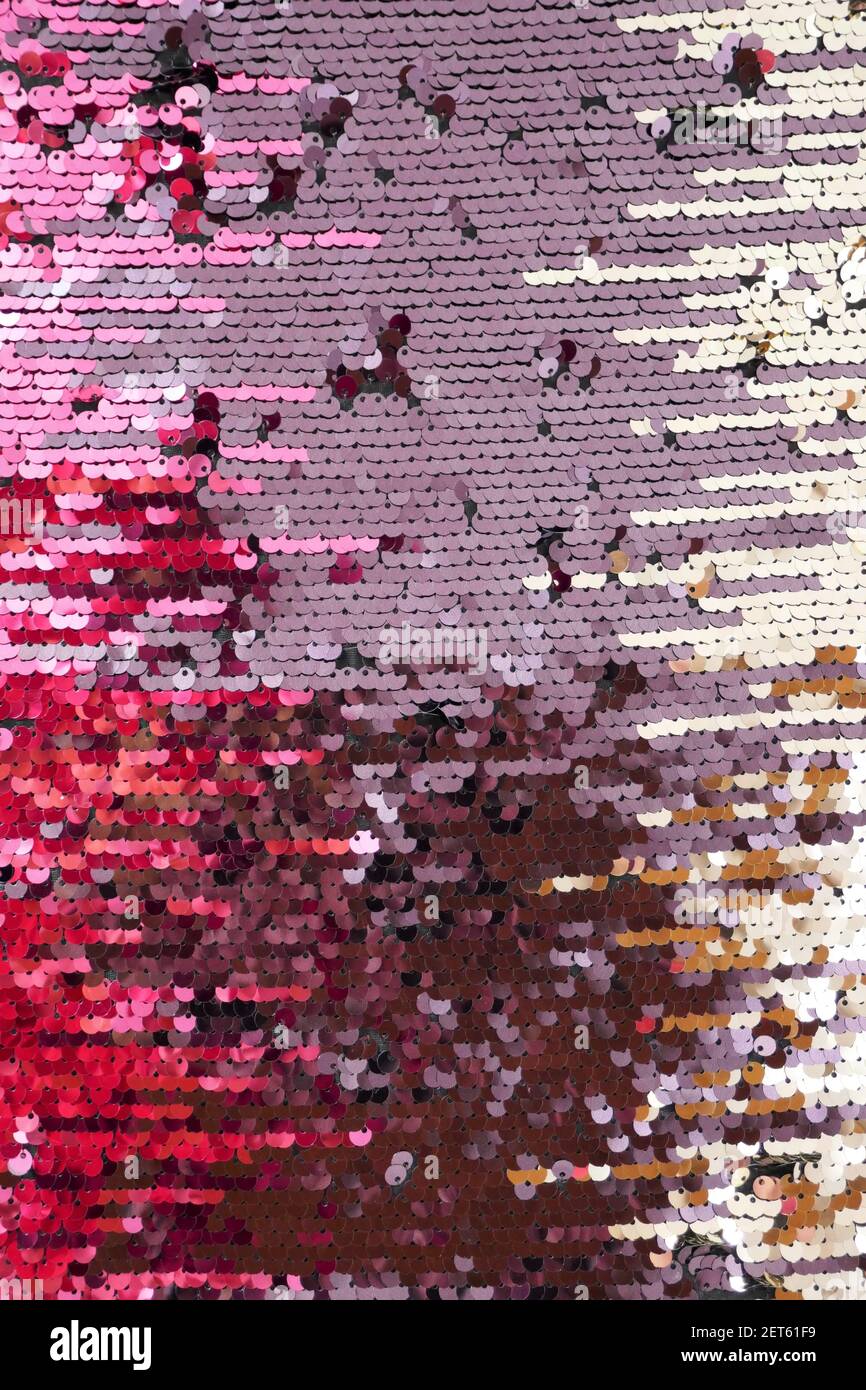 Sequins macro background.Pink, burgundy and purple sequins background ...