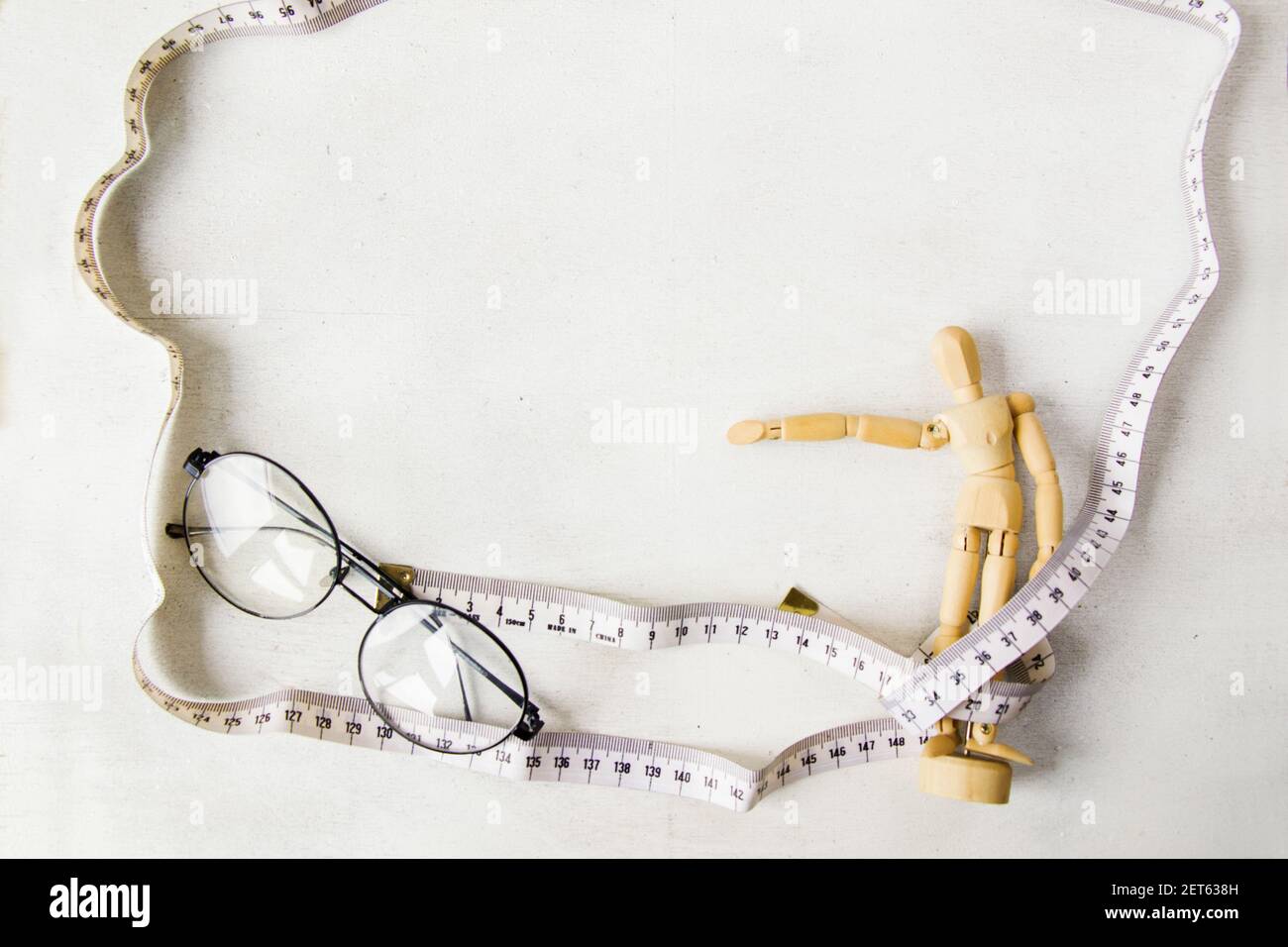 A sew set, sew things on the white background. measuring and glass ...