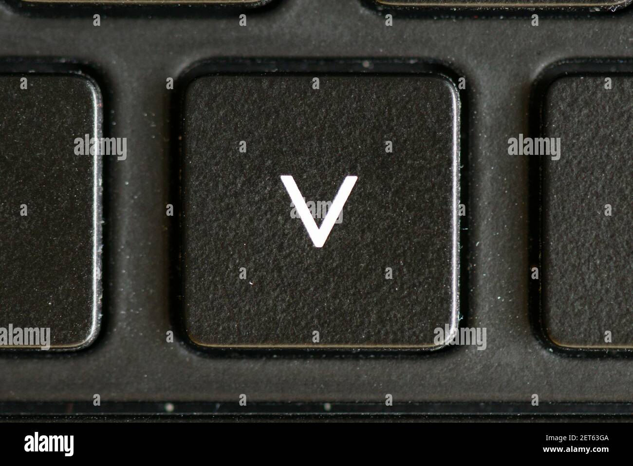 V key on a laptop keyboard Stock Photo - Alamy