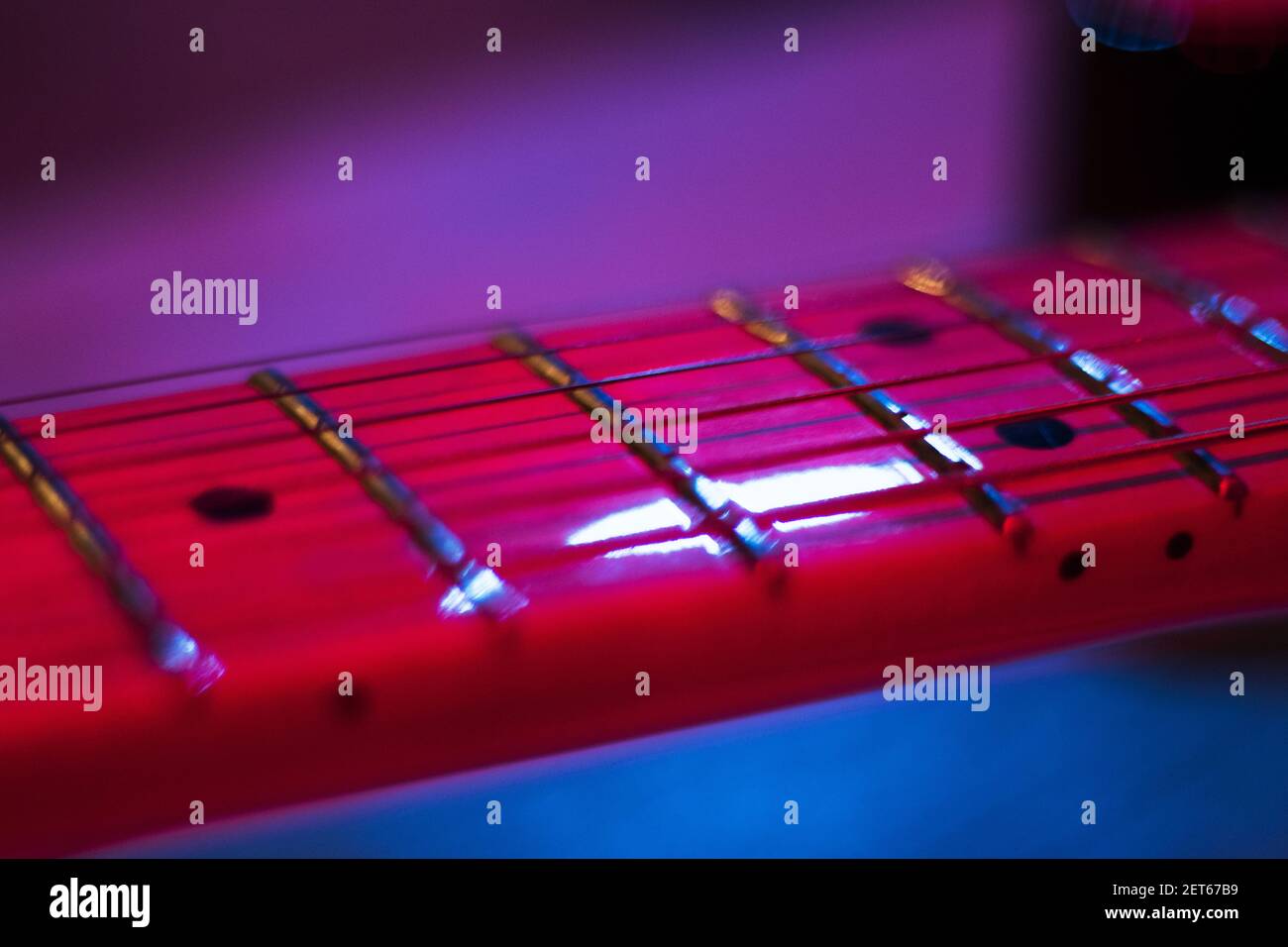 The guitar instrument close-up and macro, led red light and object ...