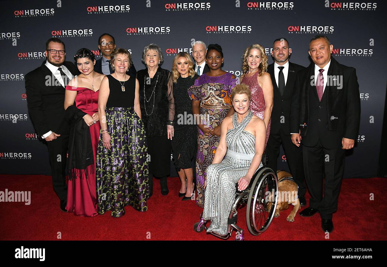 the top 10 CNN Heroes with Kelly Ripa and Cooper attend the 12th Annual ...