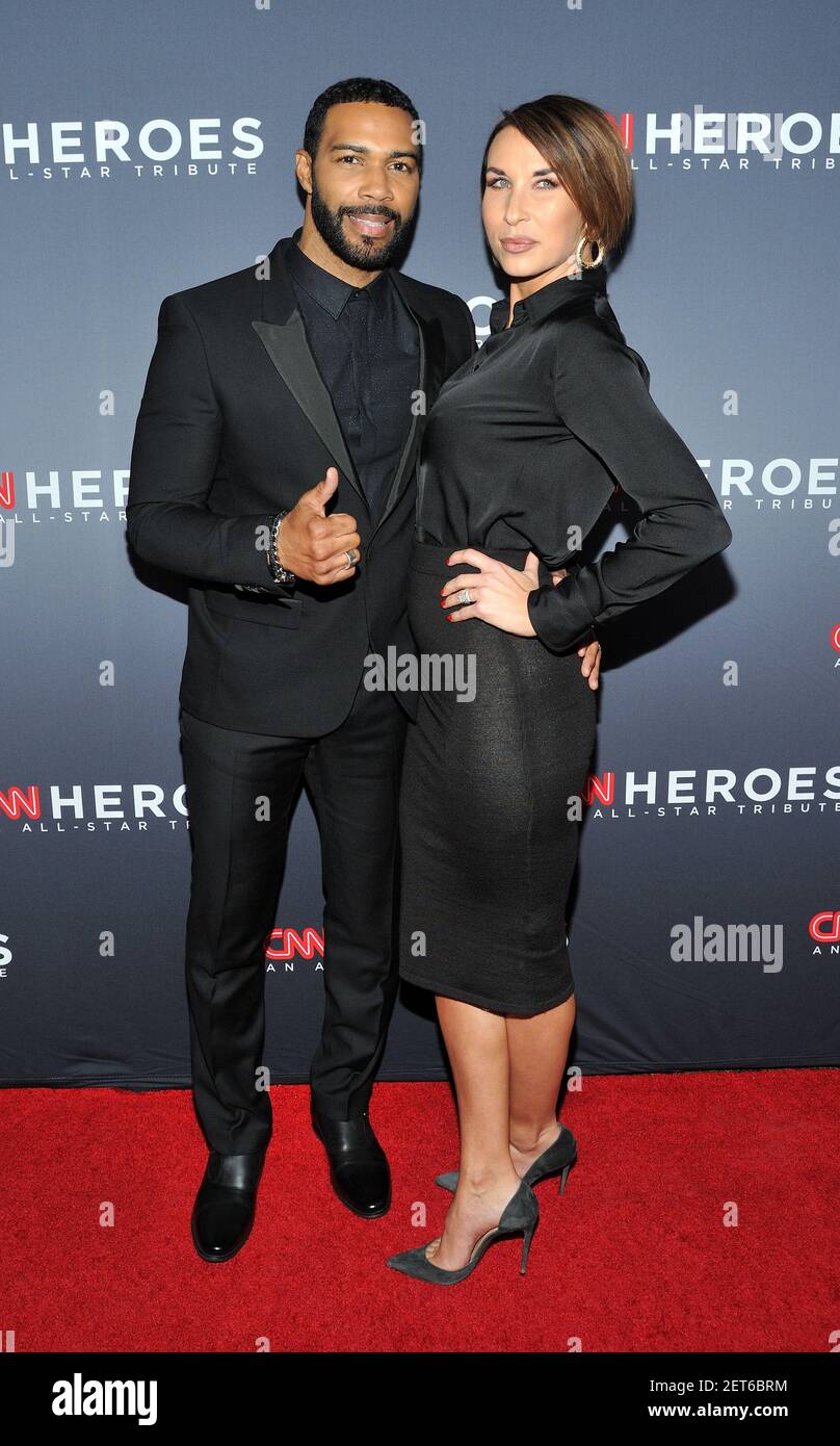L-R: Actor Omari Hardwick and wife Jennifer Pfautch attend the 12th ...