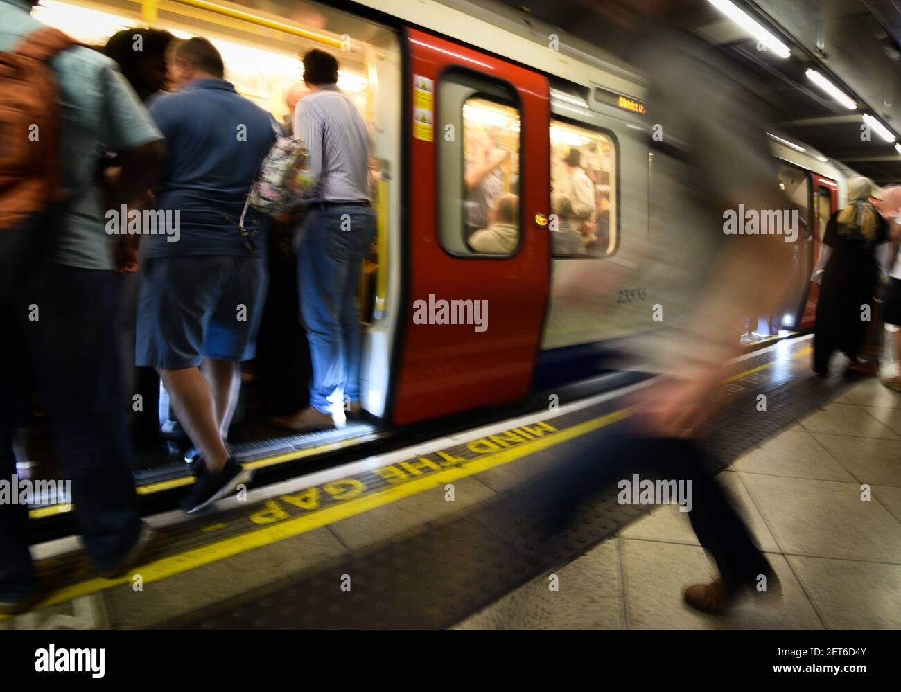 Random passengers people at the underground tube station tfl with ...