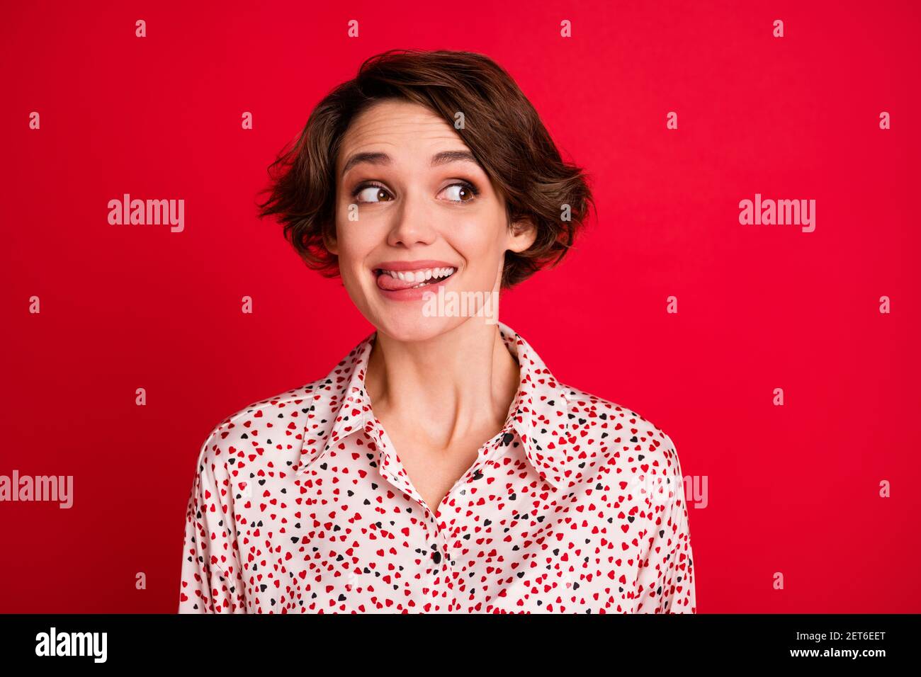 Portrait Of Attractive Cheerful Dreamy Brown Haired Girl Licking Lip