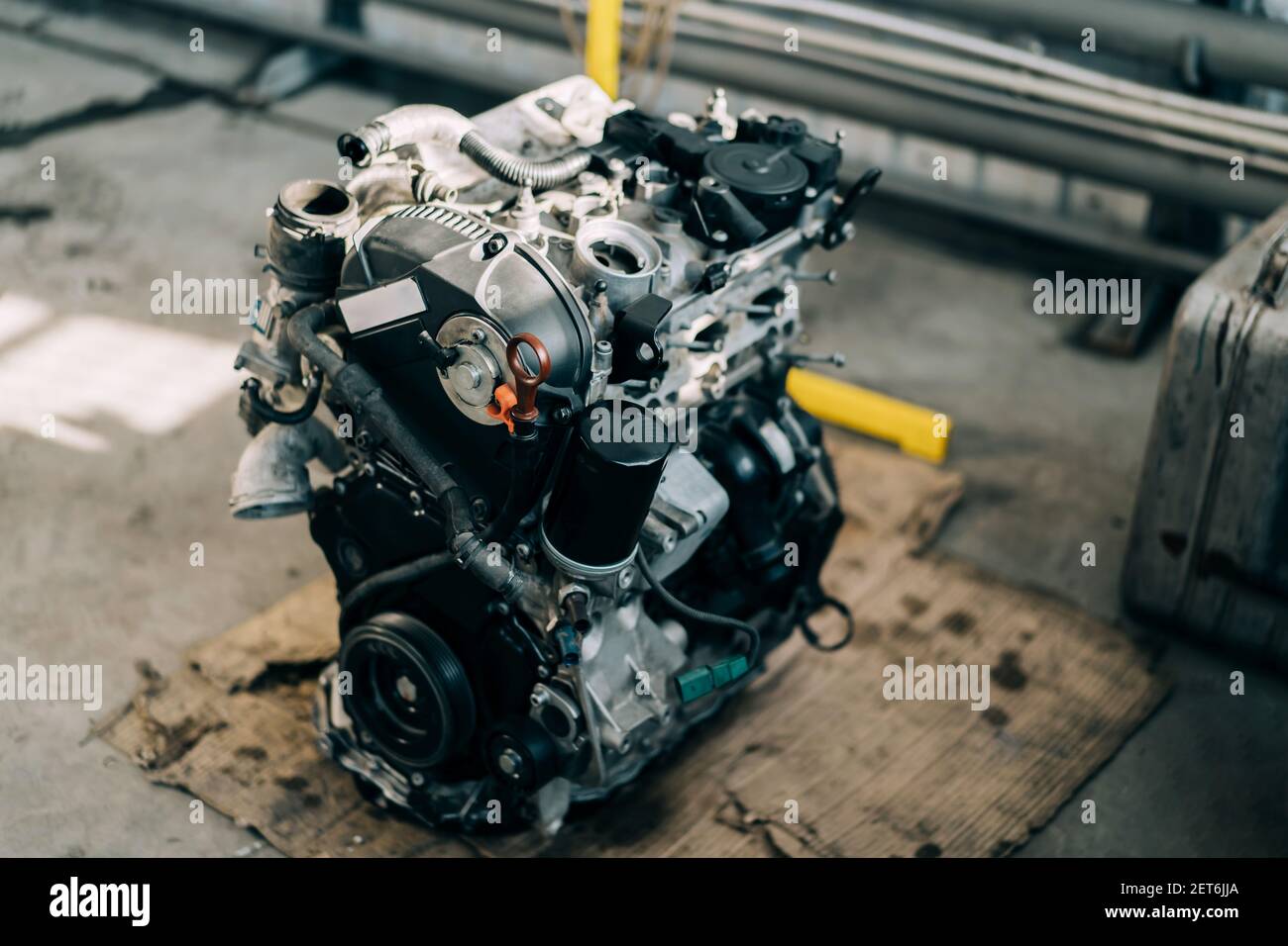 An internal combustion engine removed from a vehicle for repair ...