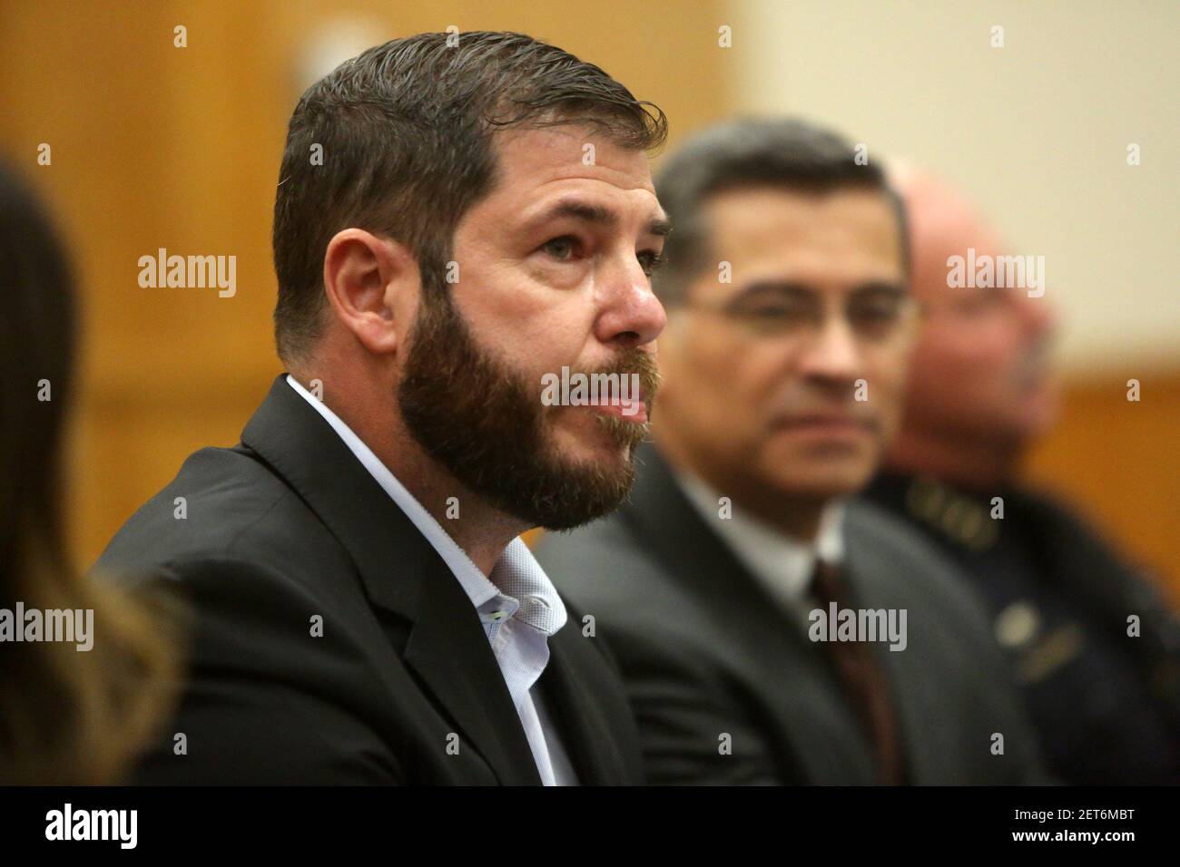 Assemblymember Joaquin Arambula, left, is shown at a roundtable with ...