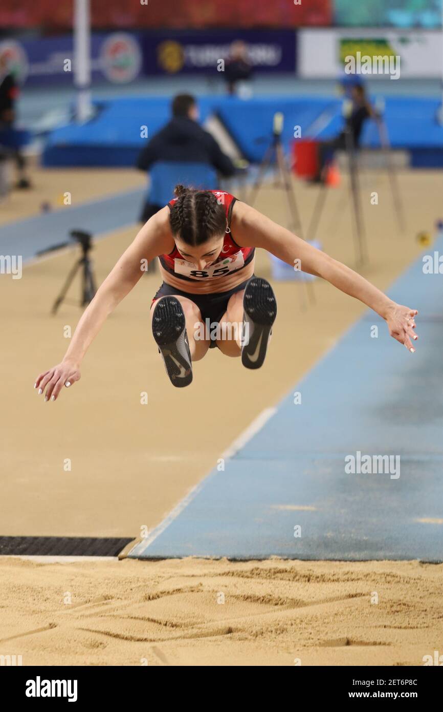 ISTANBUL, TURKEY - FEBRUARY 20, 2021: Undefined athlete triple jumping ...
