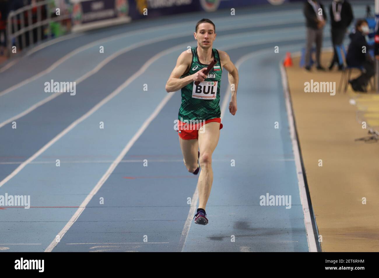 ISTANBUL, TURKEY - FEBRUARY 20, 2021: Undefined athlete running 4x400 ...