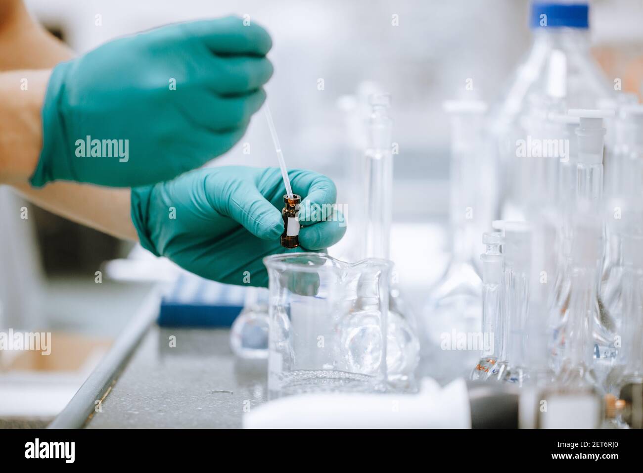 Pharmaceutist testing of a new drugs and pills in the pharmacy ...