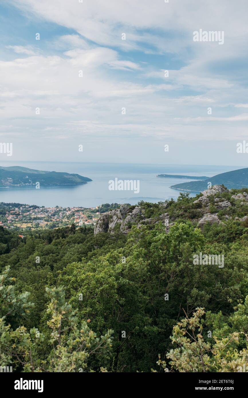 A beautiful scenery of a village seen from the top of a hill in Herceg ...