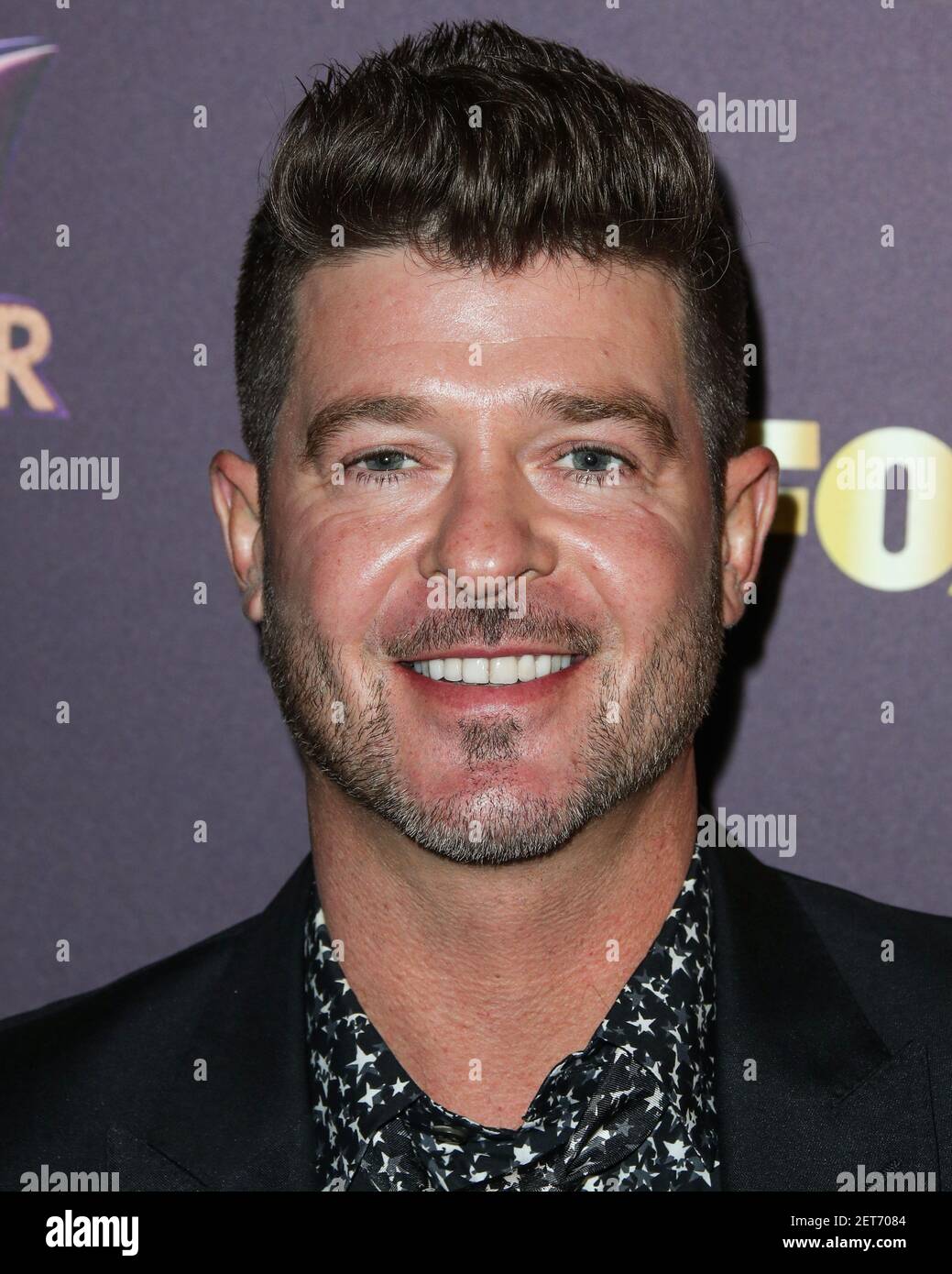 LOS ANGELES, CA, USA - DECEMBER 13: Singer Robin Thicke arrives at Fox ...