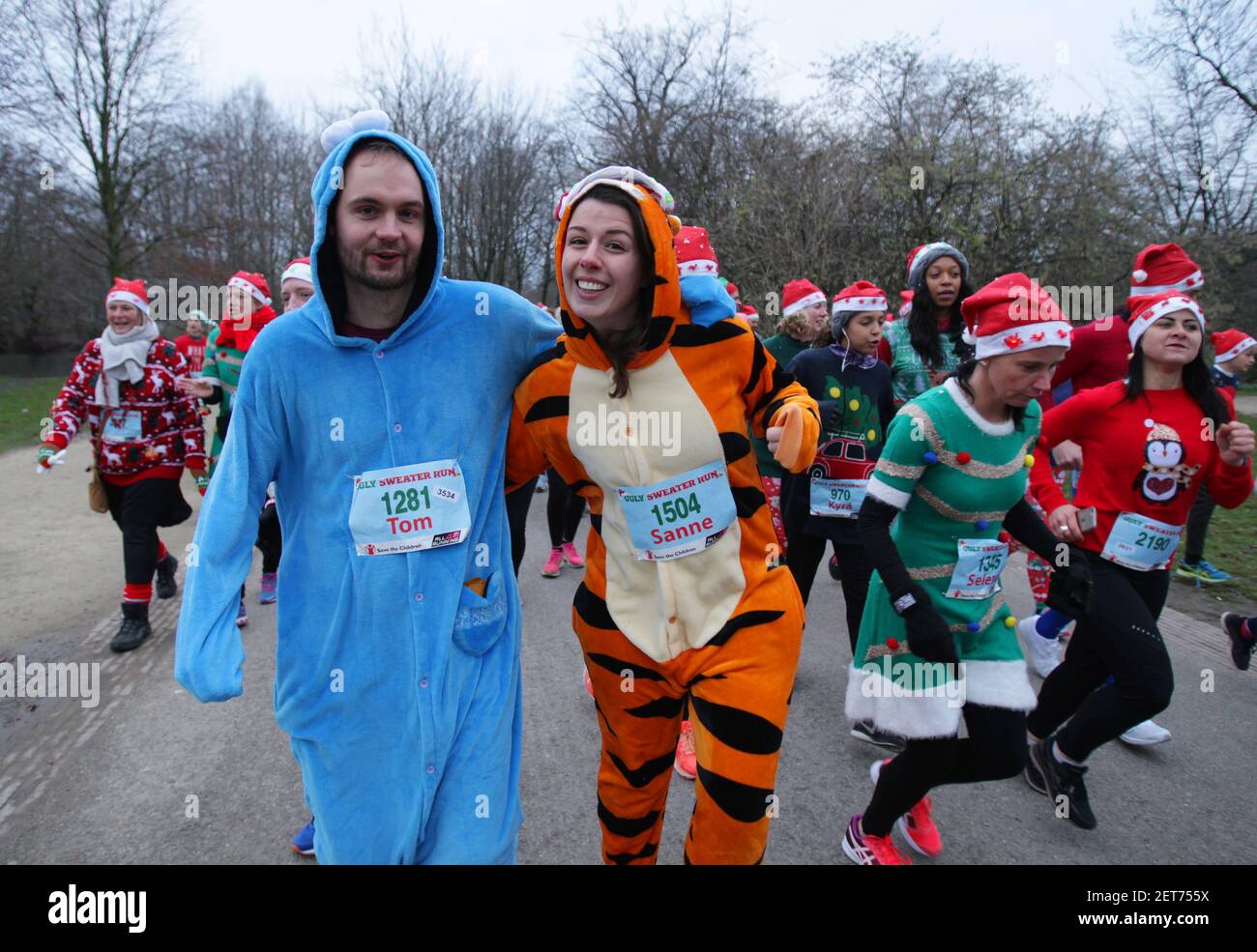 People take part during Ugly Christmas Sweater run at the Vondelpark on ...