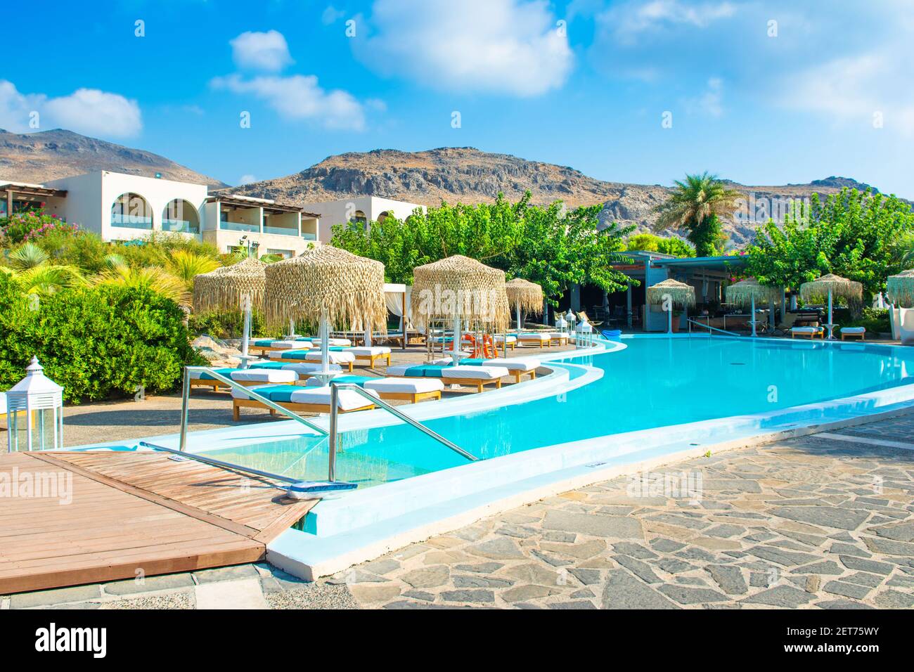 Rhodes, Greece - 18 July 2019: Outdoor pool area in a luxury hotel on ...