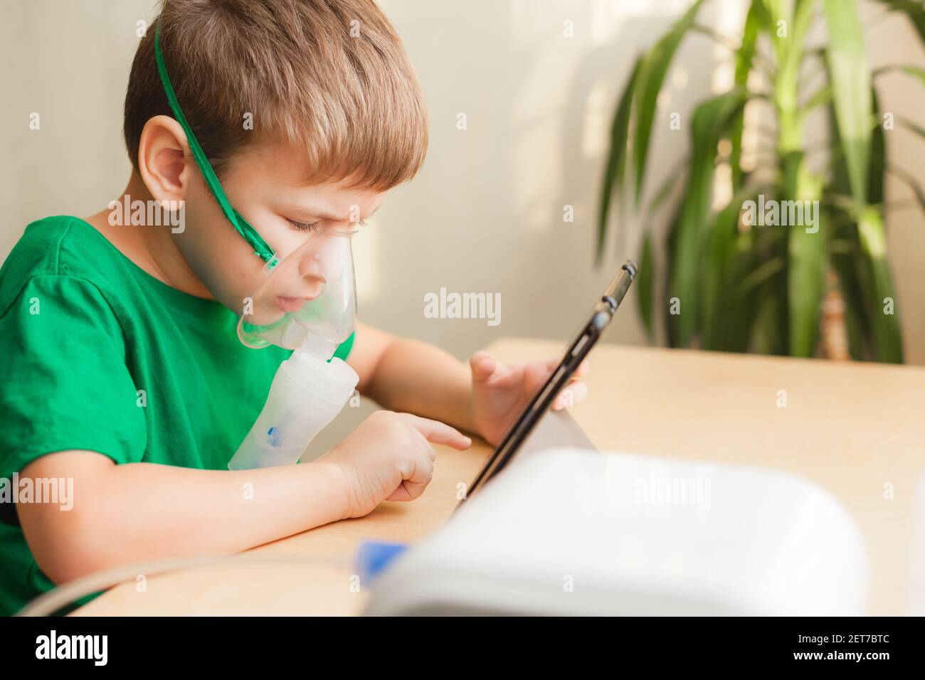 Boy using inhaler asthma hi-res stock photography and images - Alamy