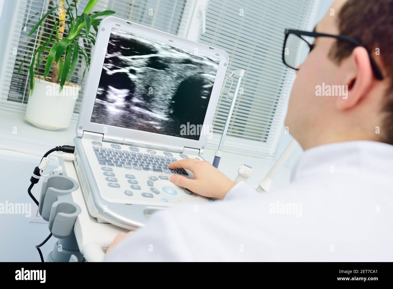 Doctor checking patient endocrine hi-res stock photography and images ...
