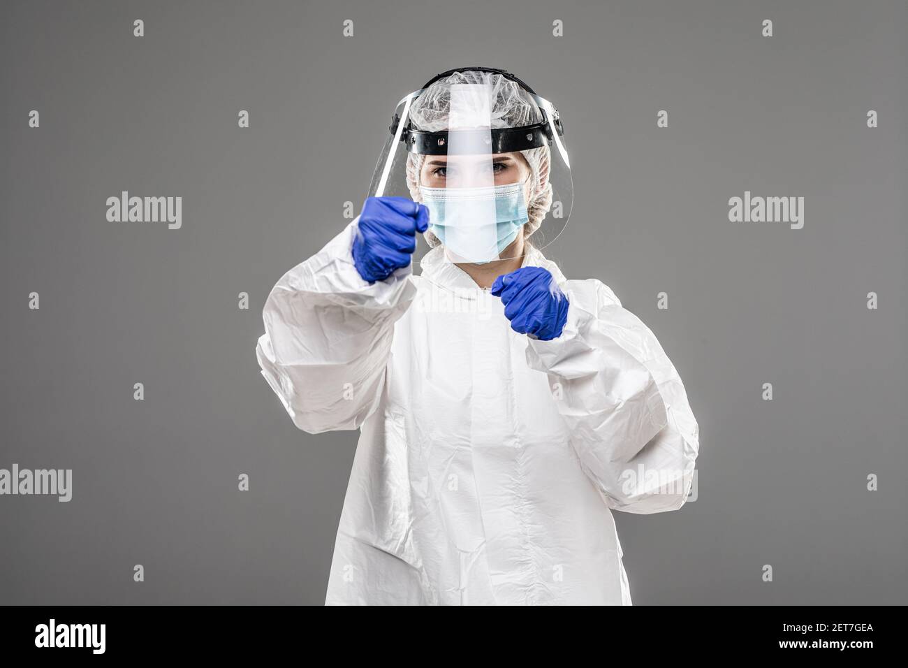 Woman doctor in overall protection hazmat suit fighting pandemic ...
