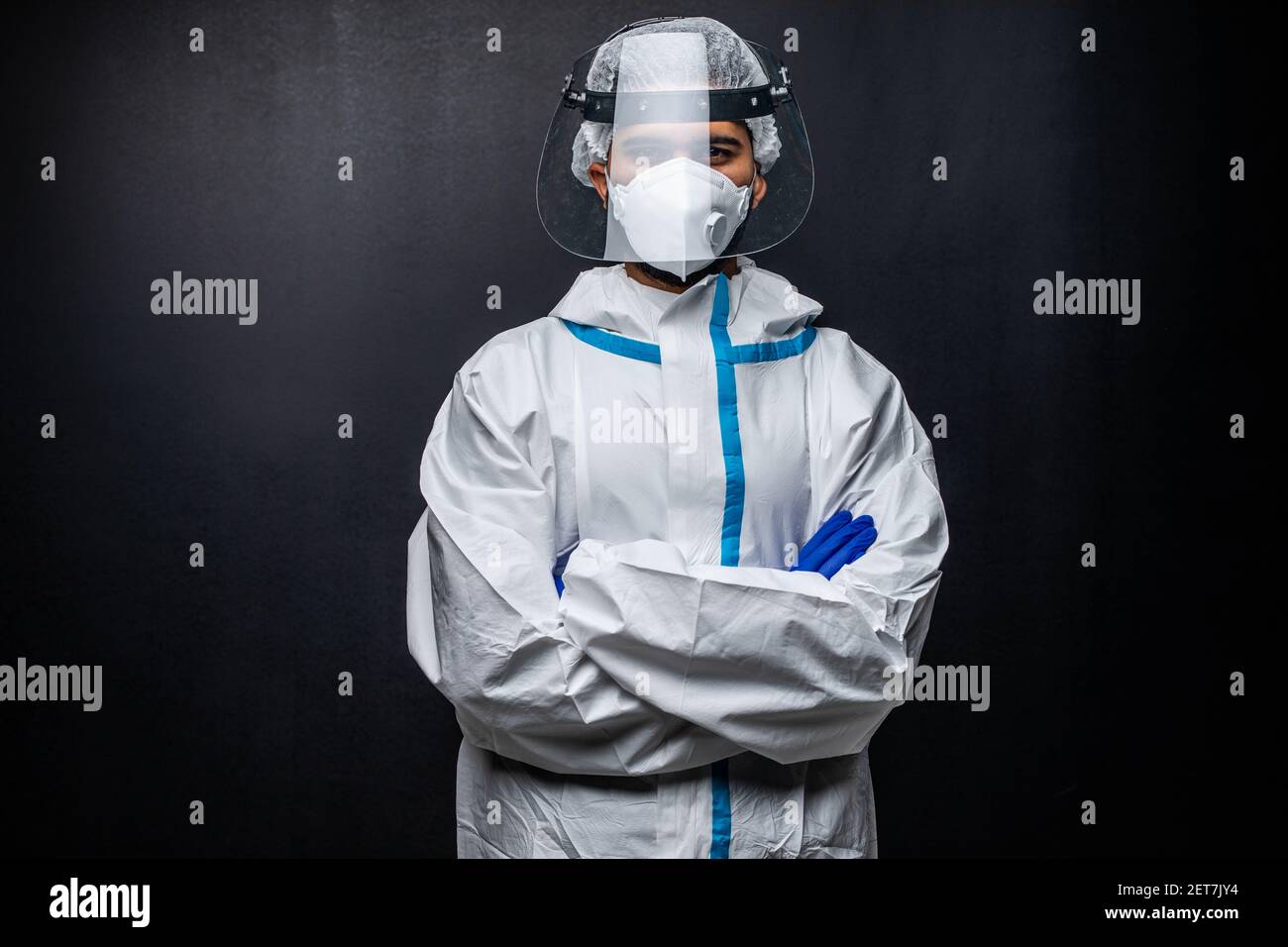 Man doctor covid19 wearing in biohazard PPE on black background Stock ...