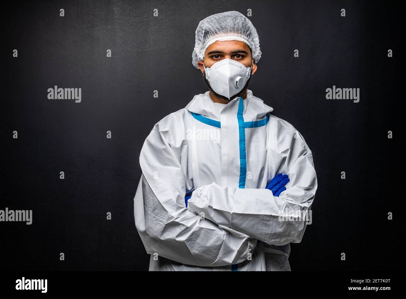 Man doctor covid19 wearing in biohazard PPE on black background Stock ...