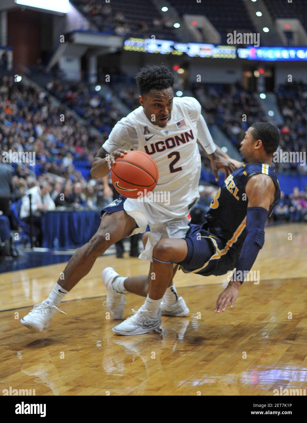 DECEMBER 18, 2018: Tarin Smith (2) of the Uconn Huskies drives to the ...