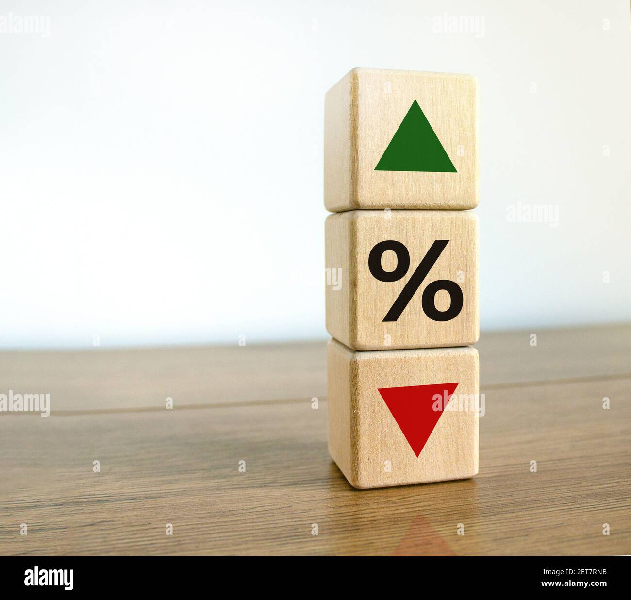 Interest rates symbol. Wooden cubes with the direction of an arrow ...
