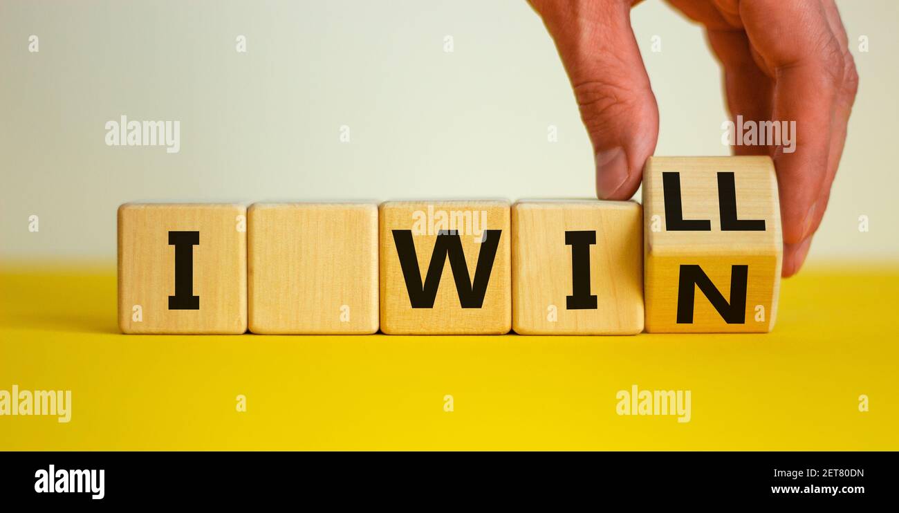 I will win symbol. Businessman turns cubes and changes words i will to ...