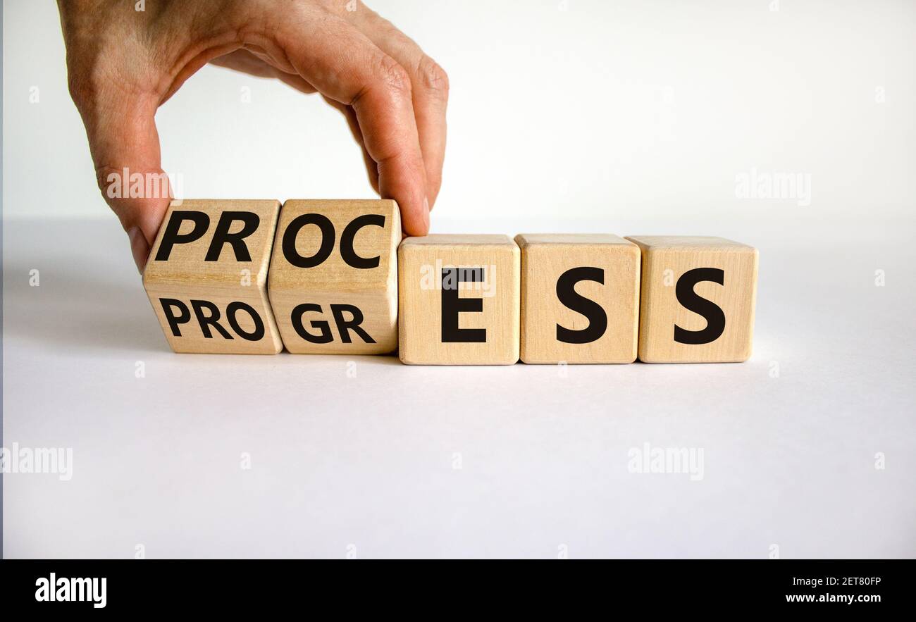 Process and progress symbol. Businessman turns wooden cubes and changes ...