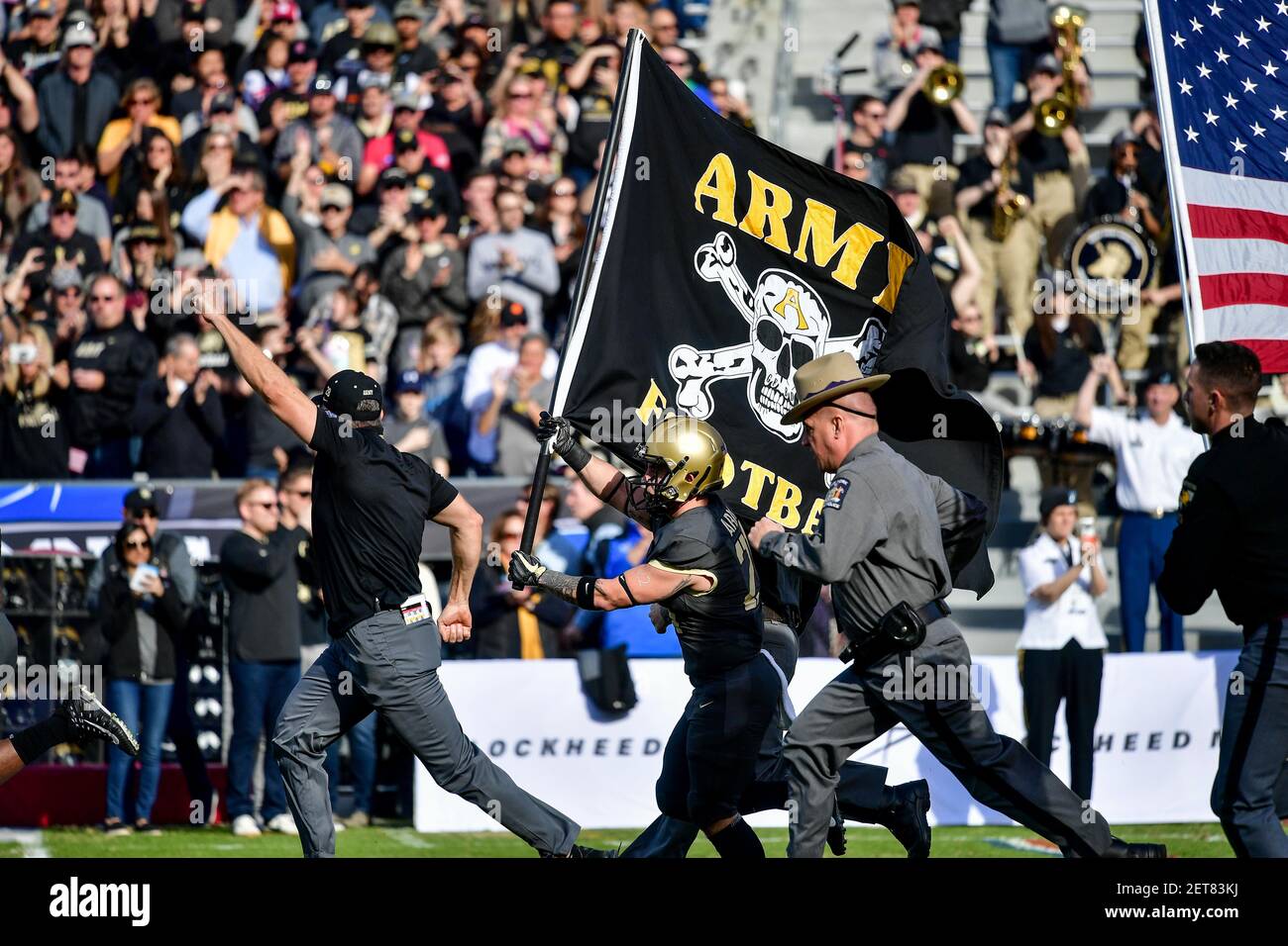 Army team takes the field during the Lockheed Martin Armed Forces Bowl ...