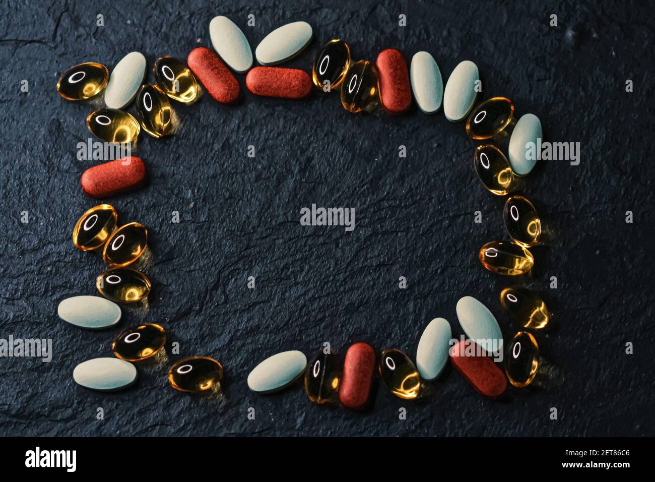 Frame made of medical pills as flatlay background, health and wellness ...